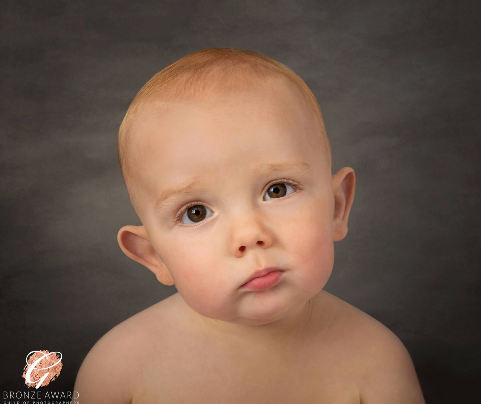 studio-portrait-of-a-super-cute-little-boy-with-a-quizzical-expression ...